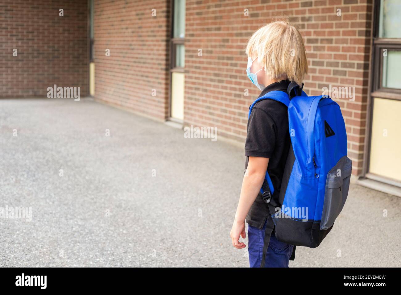 Little child in mask during corona virus outbreak. Little kid wearing ...