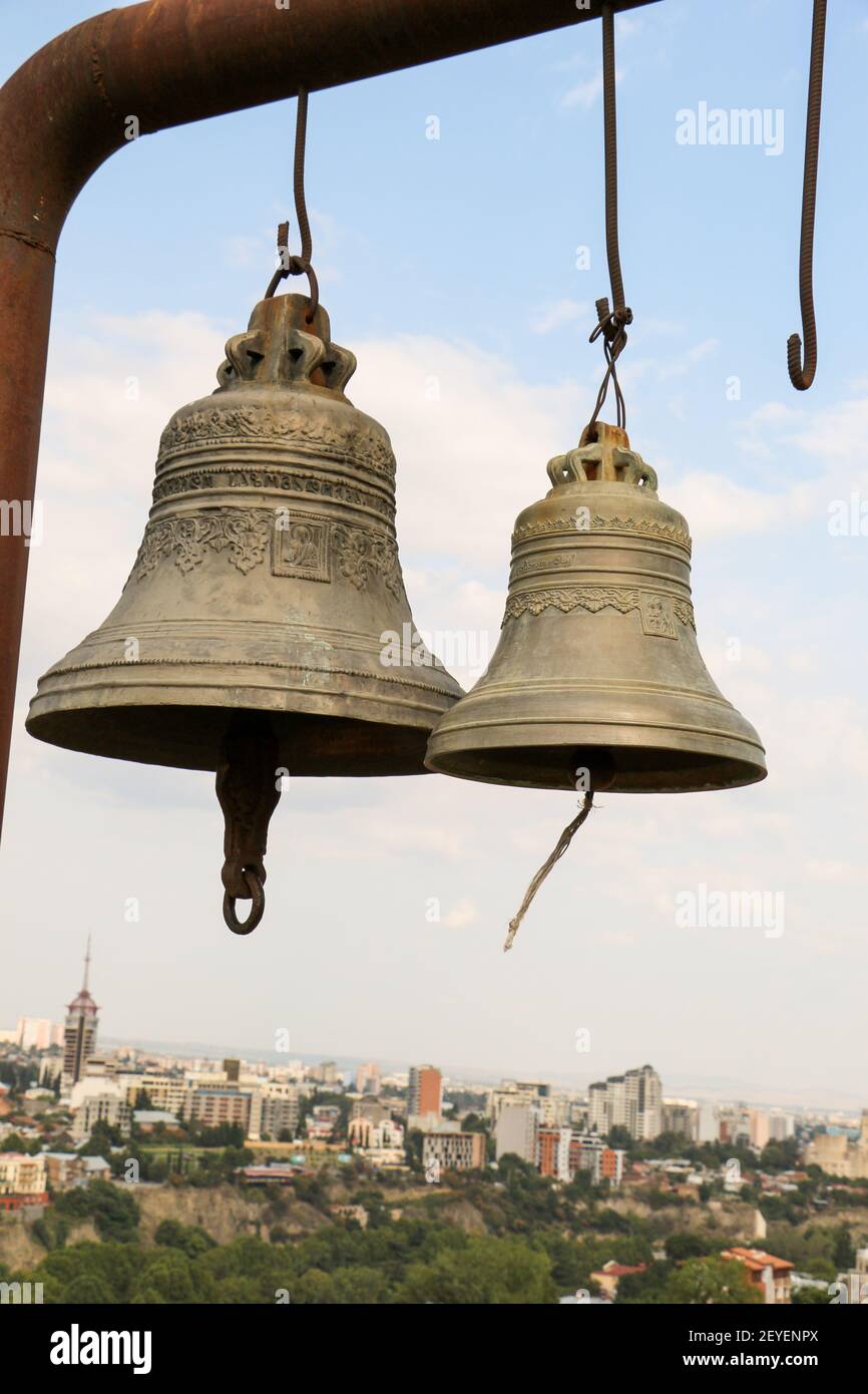 Old twin traditional metal church bells Stock Photo - Alamy