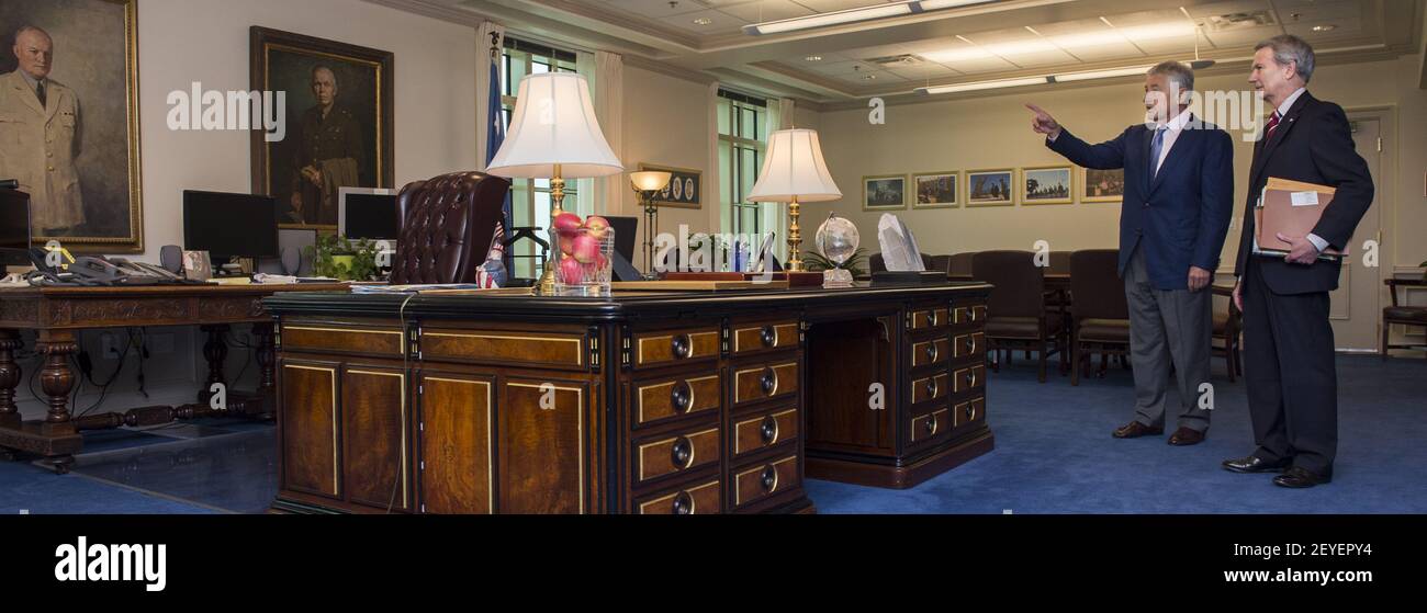 Secretary of Defense Chuck Hagel talks with Congressman Walter Jones ...