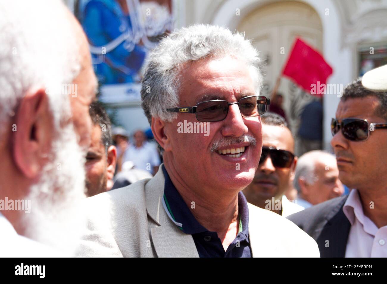 Hamma Hammemi between his bodyguards during a weekly vigil to remember ...