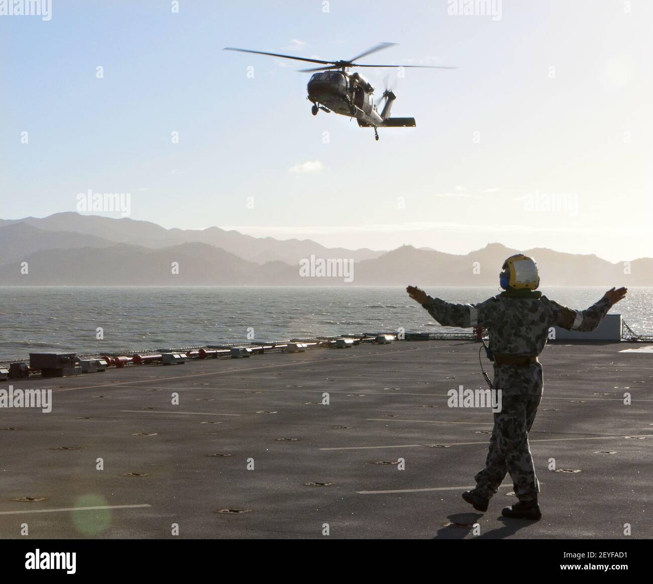 An Australian Army S70A-9 Black Hawk helicopter prepares to land on the ...