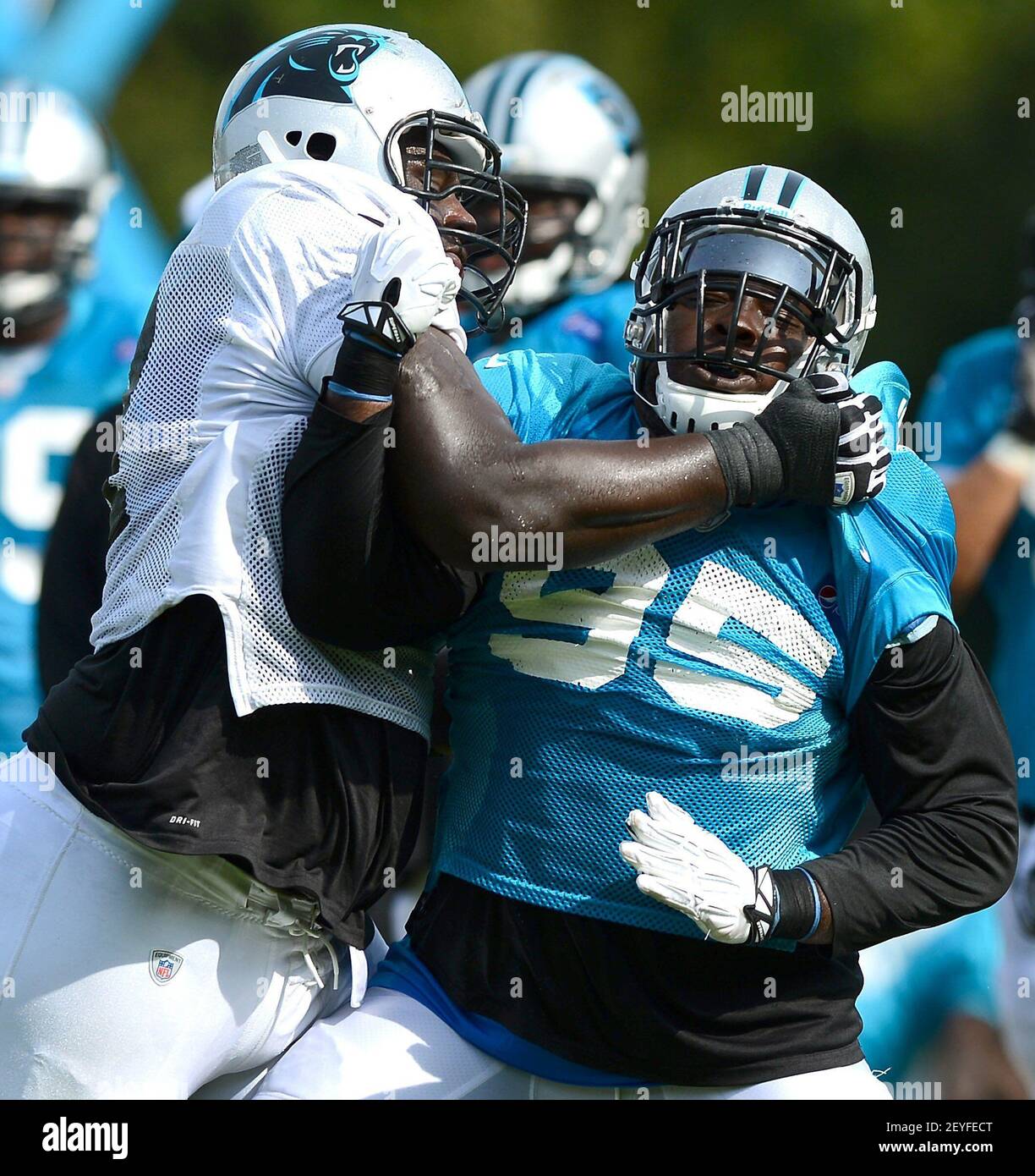 Carolina Panthers tackle Byron Bell (77) and defensive end Charles ...