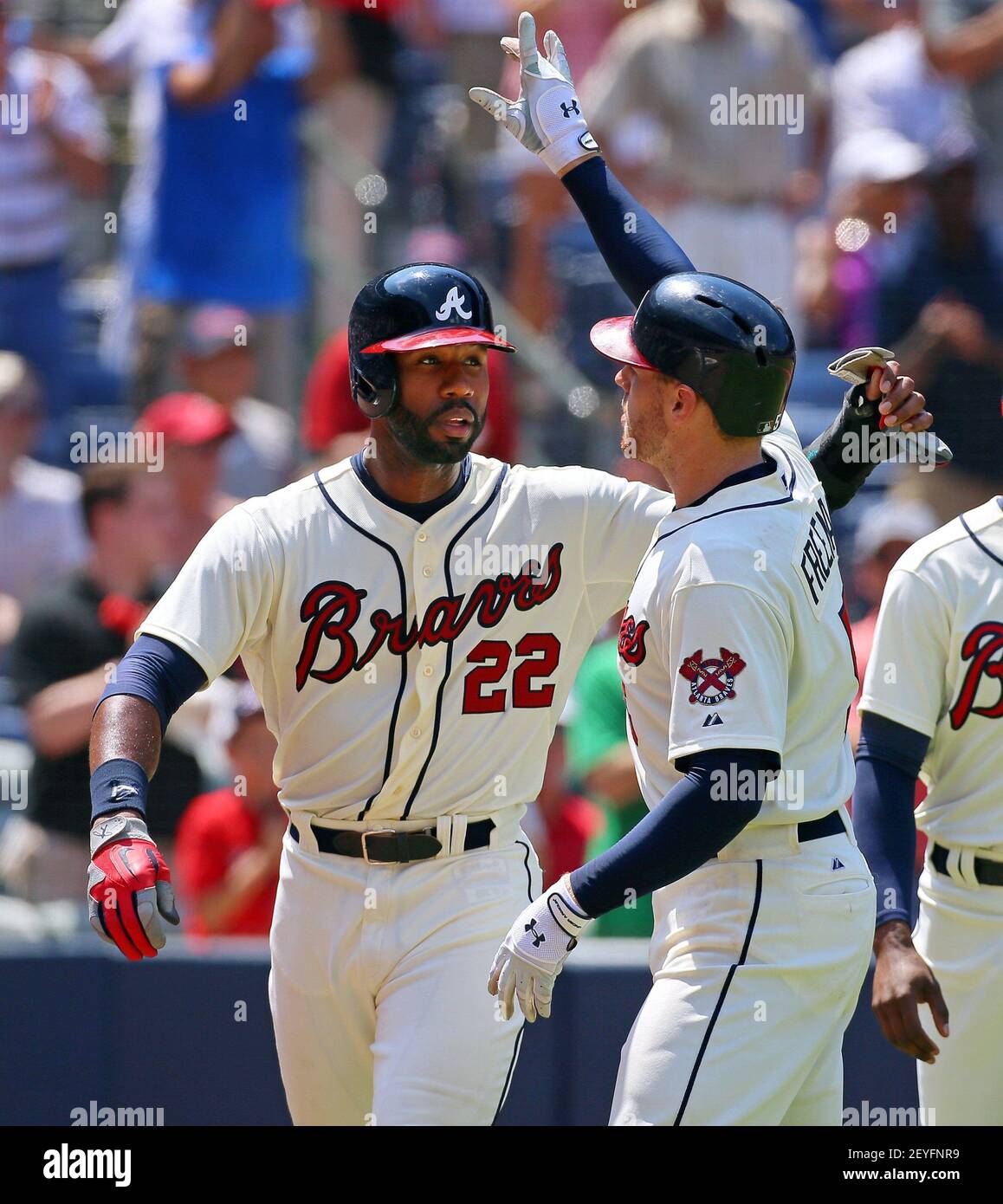 Atlanta Braves' Freddie Freeman waves to fans while celebrating his 3 ...