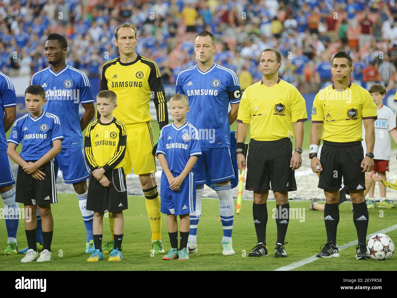 Chelsea FC defender John Terry (26) center, stands with referees and ...