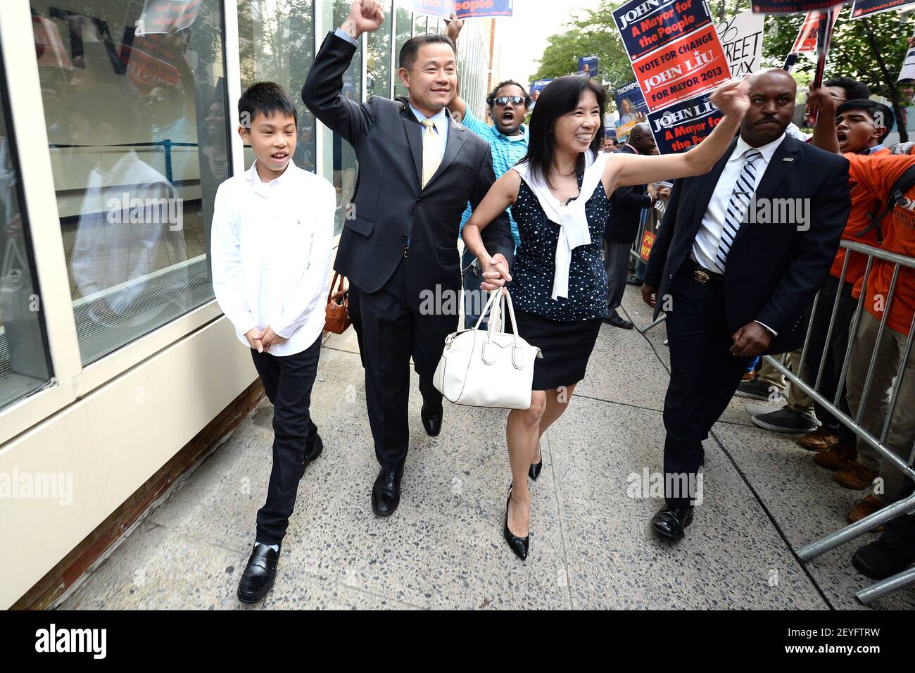 New York City Democratic Mayoral Candidate John Liu (Center) arrives with his son Joey Lui (L ...