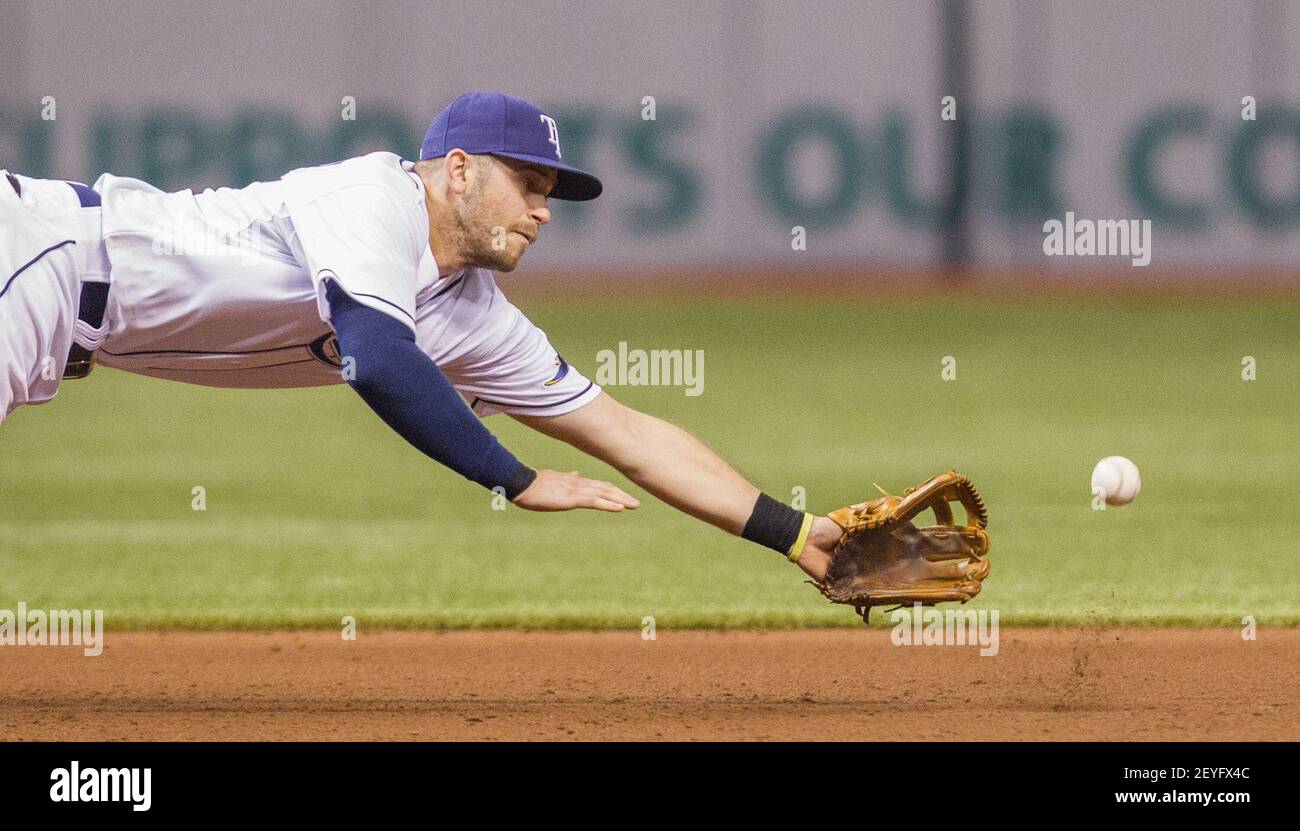 Tampa Bay Rays third baseman Evan Longoria just misses a Justin Smoak ...