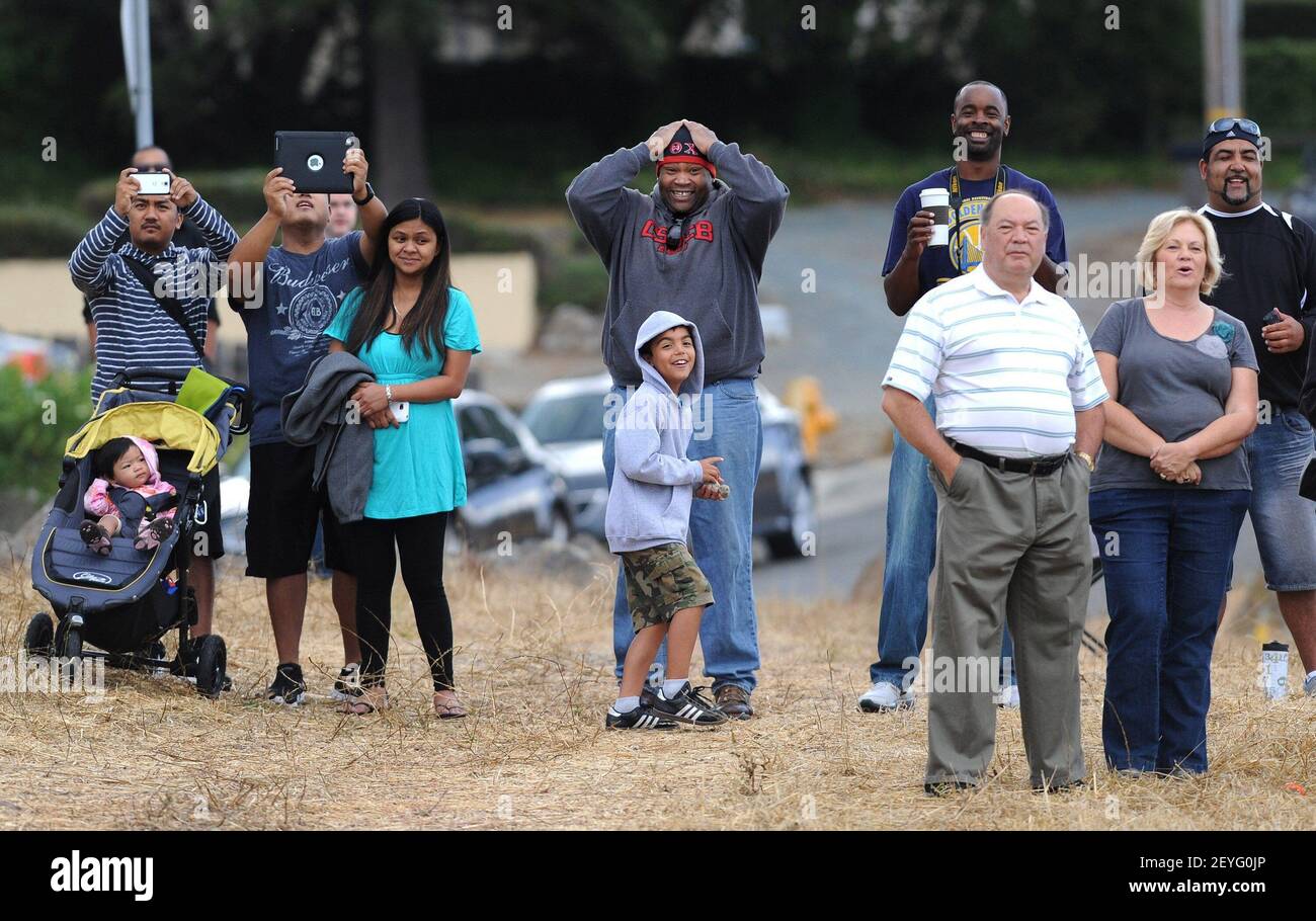 Louis Staley, center with hands on head, of Hayward, and a Cal State ...