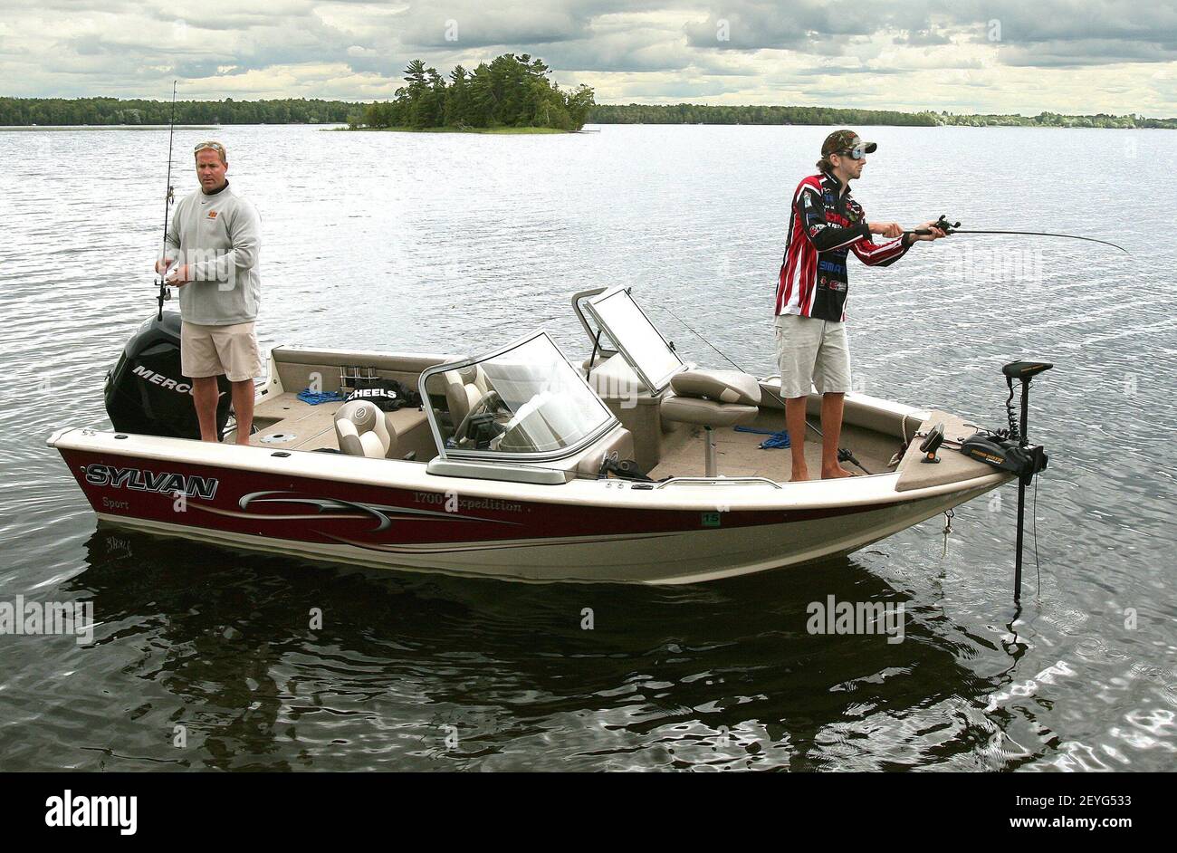 University of Minnesota football coach Curt Wiese, left, and UMD junior ...