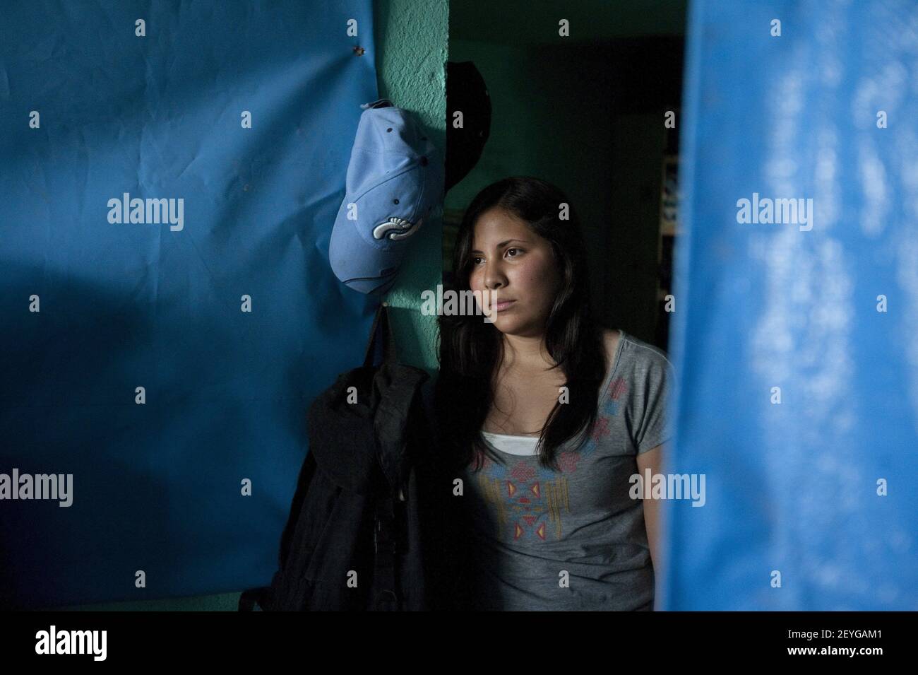 Maria Cruz, 18, stands in her home in Salvatierra, Mexico. Her brother ...