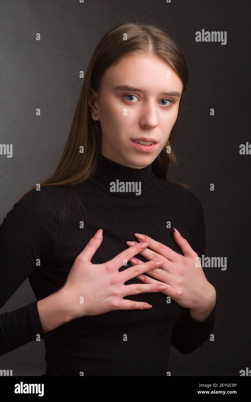 Chest hands hi-res stock photography and images - Alamy