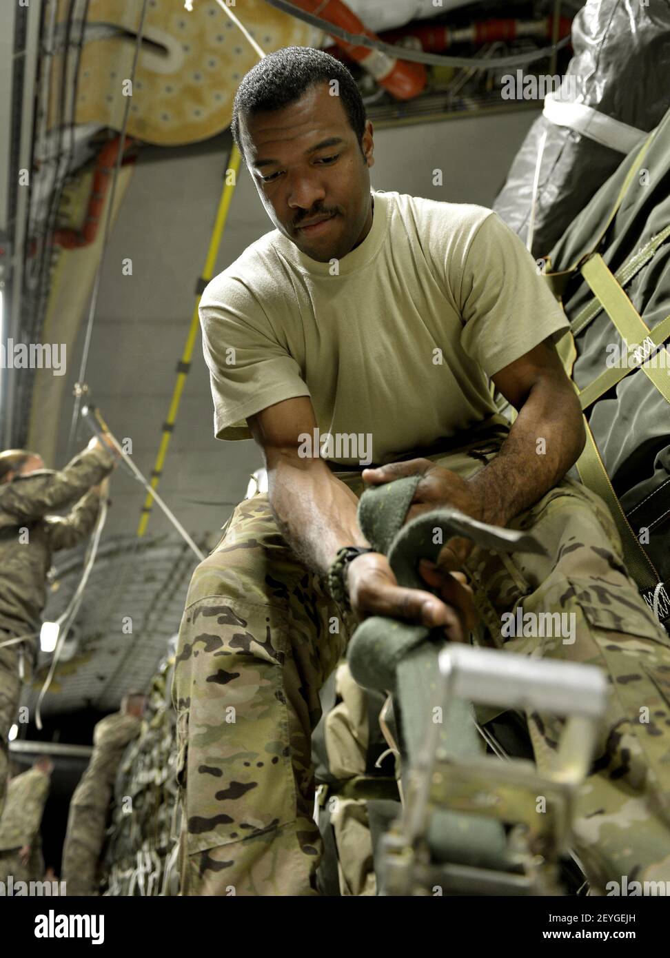 U.S. Air Force Senior Airman Shaun Larue, a joint airdrop inspection ...