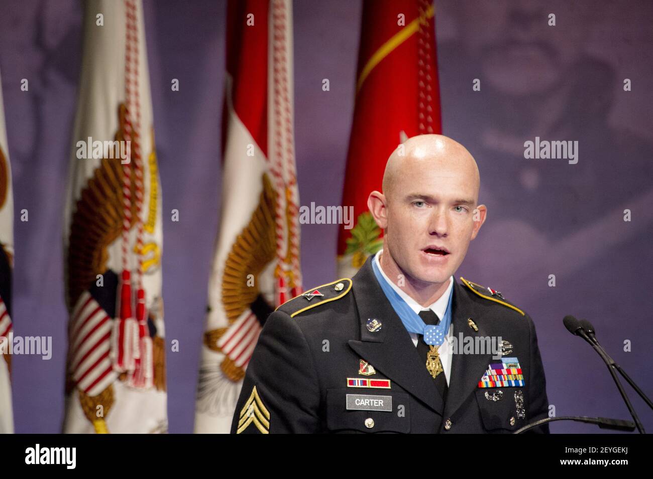 U.S. Army Staff Sgt. Ty Carter delivers remarks during a Hall of Heroes ...