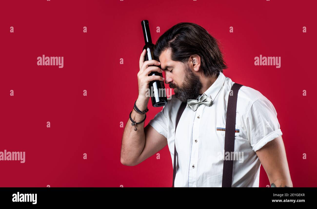 lonely evening. bartender. stylish male barman. drinking wine glass ...