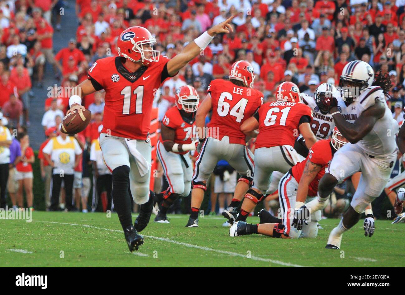 Georgia quarterback Aaron Murray (11) is chased by South Carolina ...