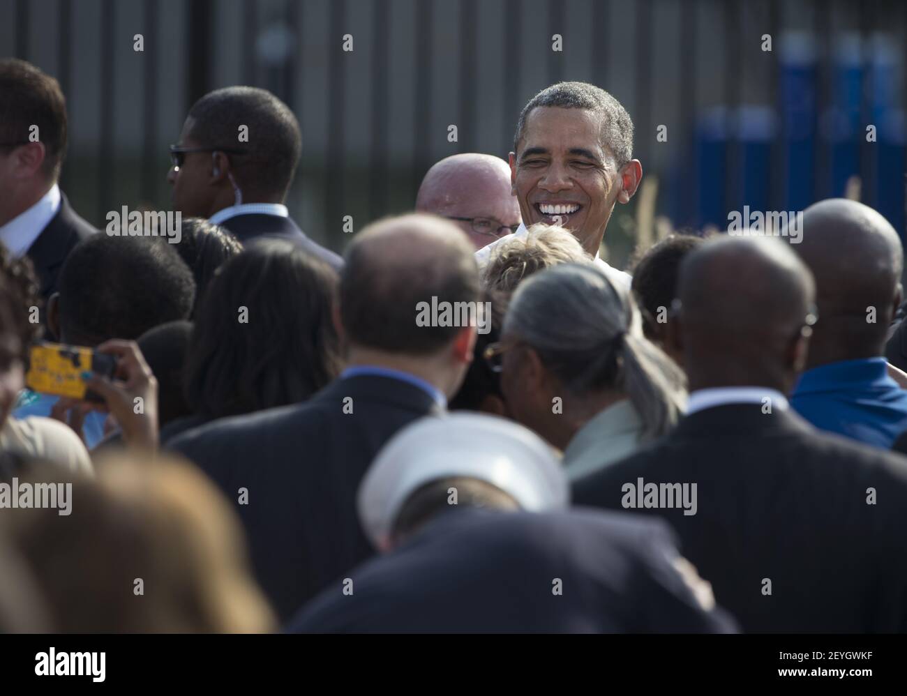 President of the United States Barack Obama meets attendees after ...