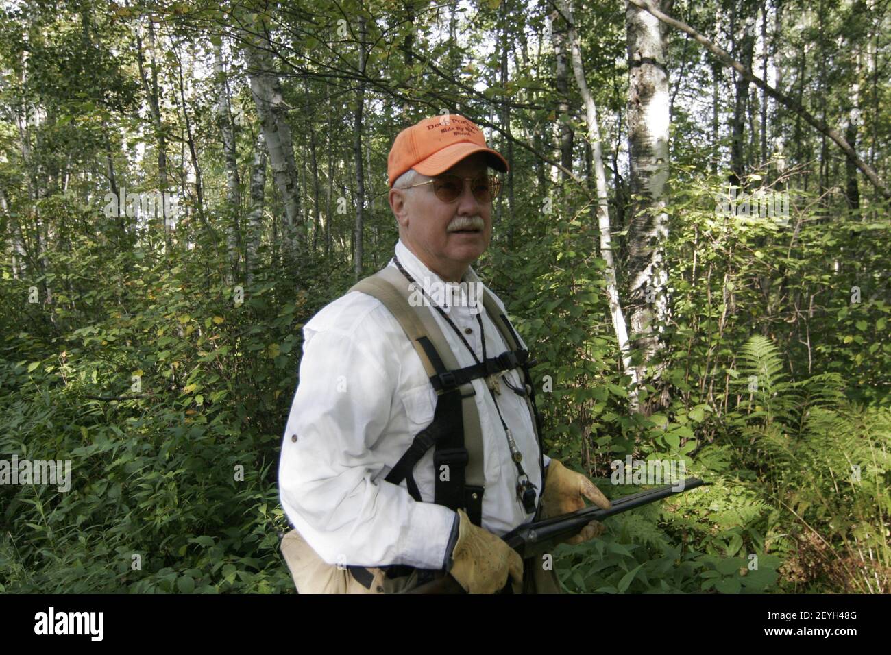 Ted Lundrigan hunts grouse on the season's opening day near Pine River ...