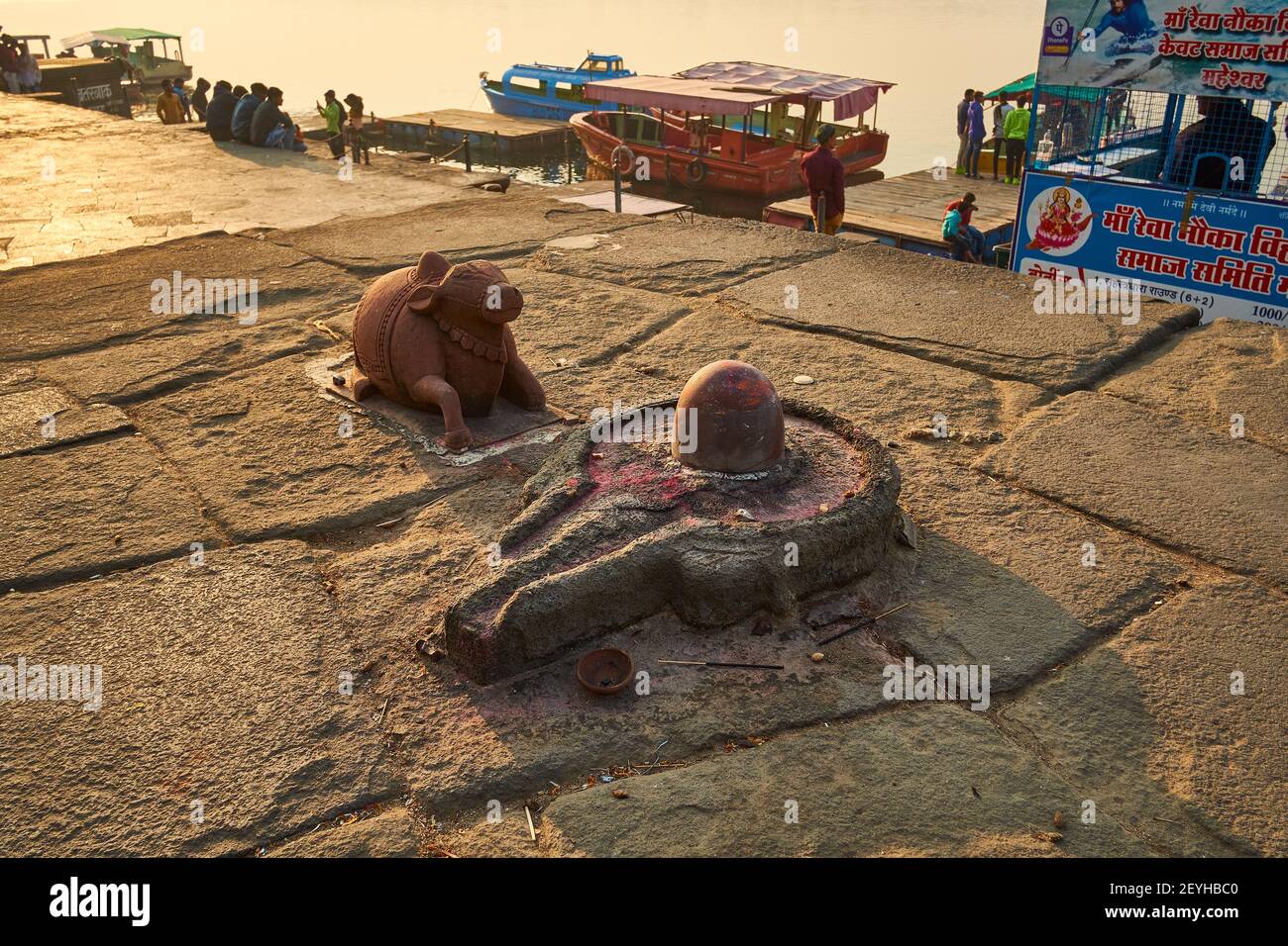 Nandi, the bull, Lord Shiva's Gatekeeper, sits next to a Shiv Ling on ...