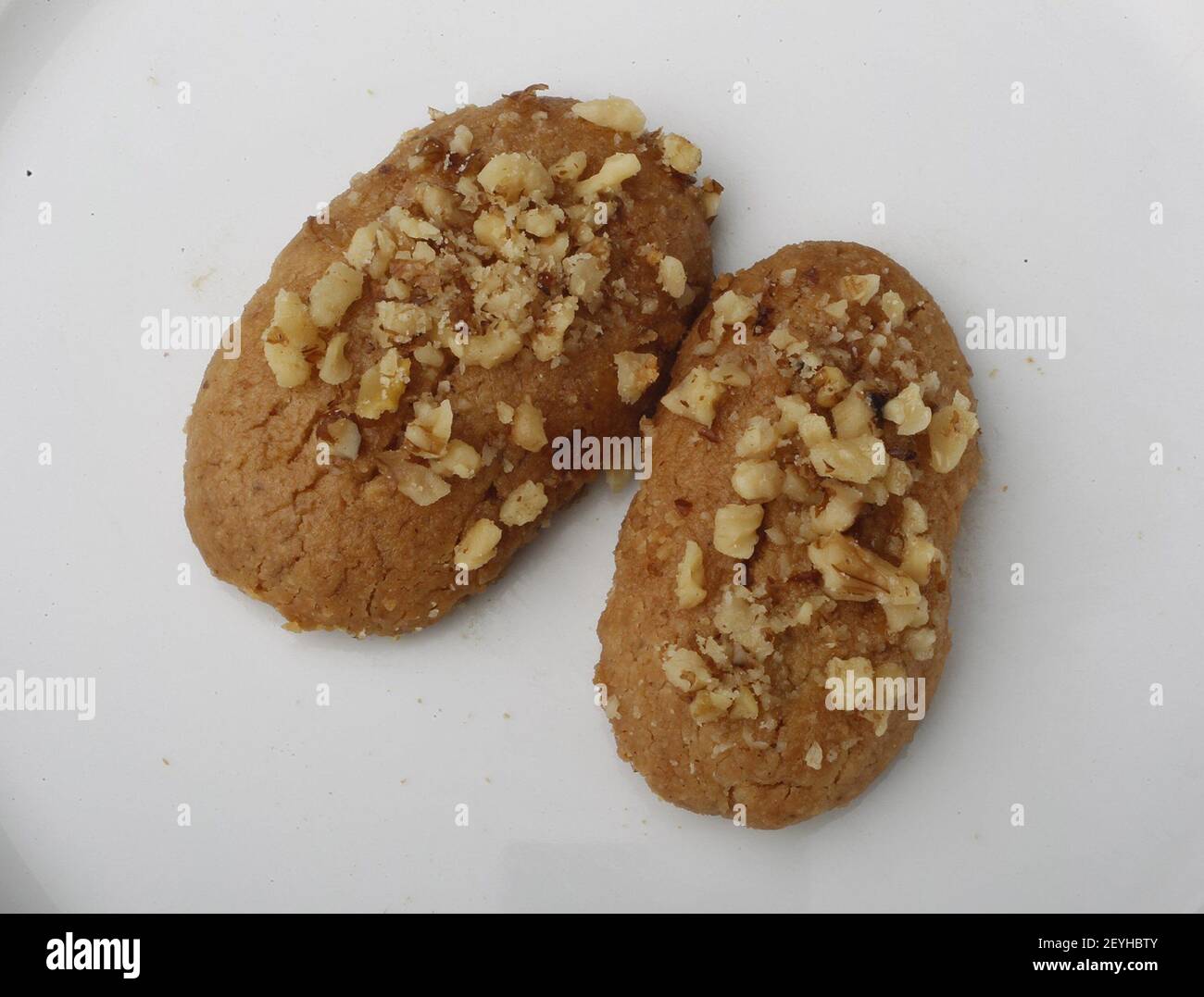 Finikia are oval-shaped cookies that are dipped in syrup and topped ...
