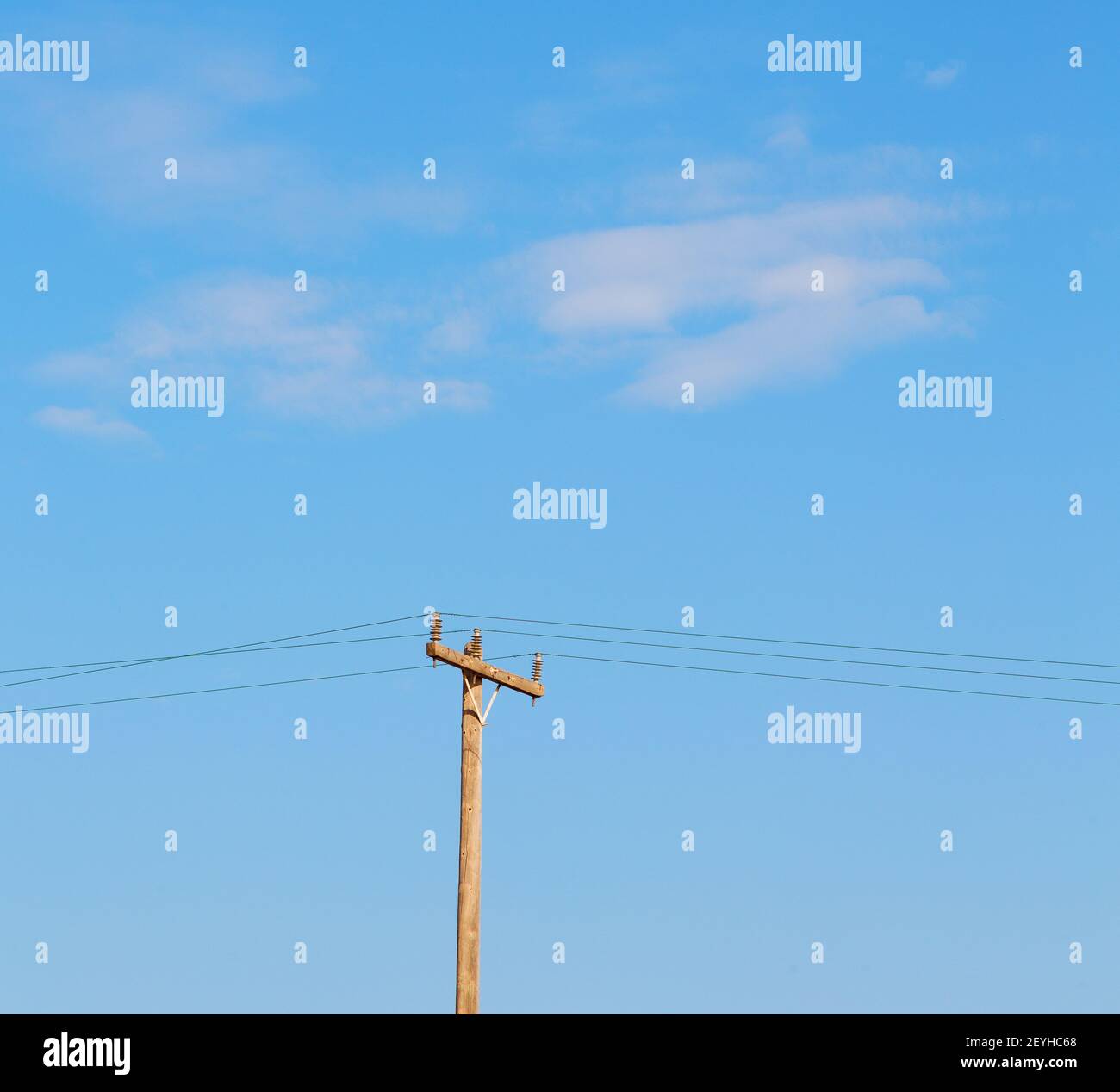 Current pole electricity line in the cloudy sky and abstract background ...