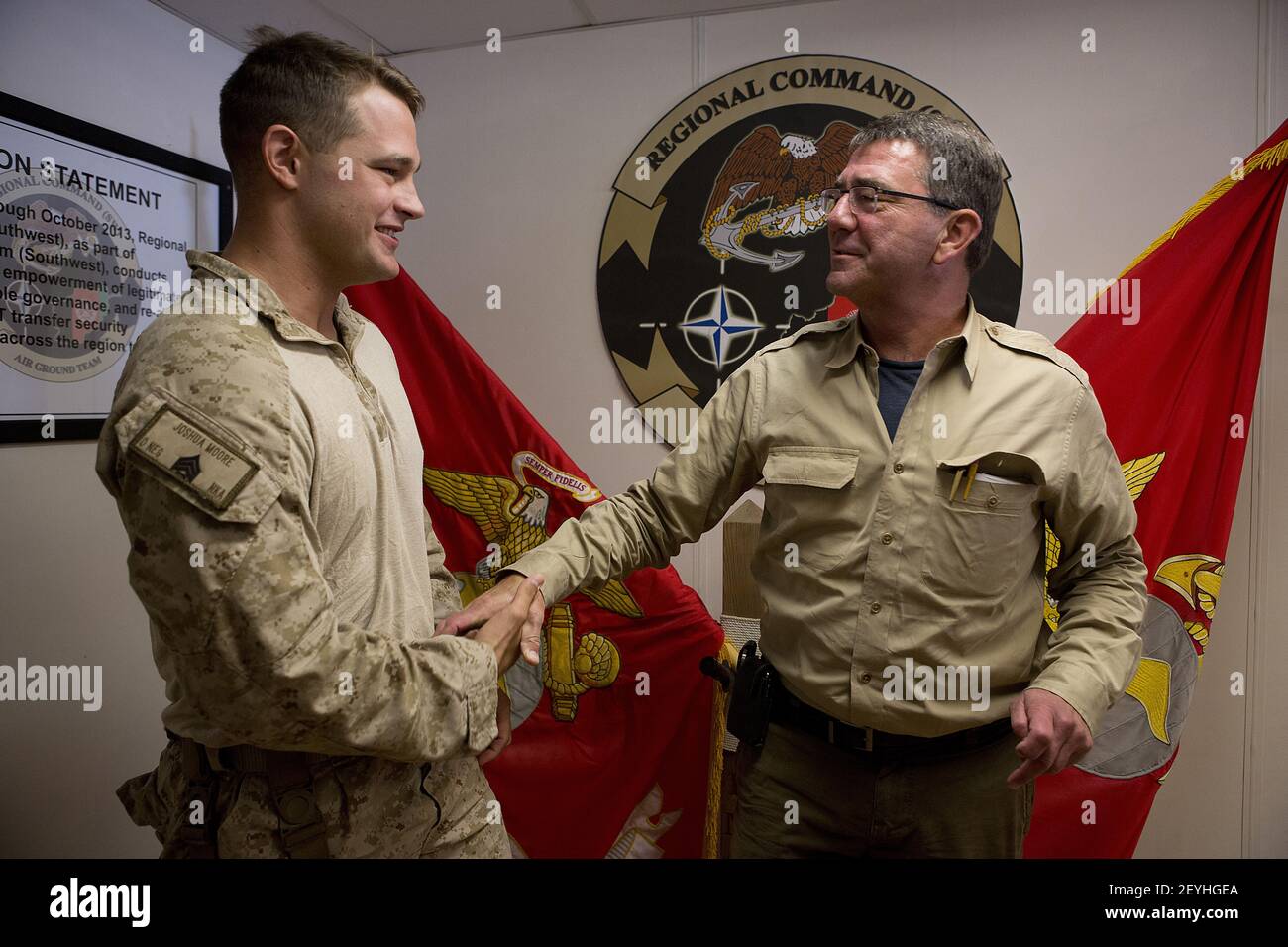 U.S. Marine Corps Sgt. Joshua Moore, left, a scout sniper team leader ...