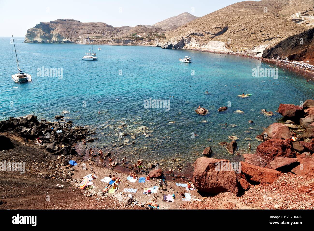 Water and beach in santorini greece Stock Photo - Alamy