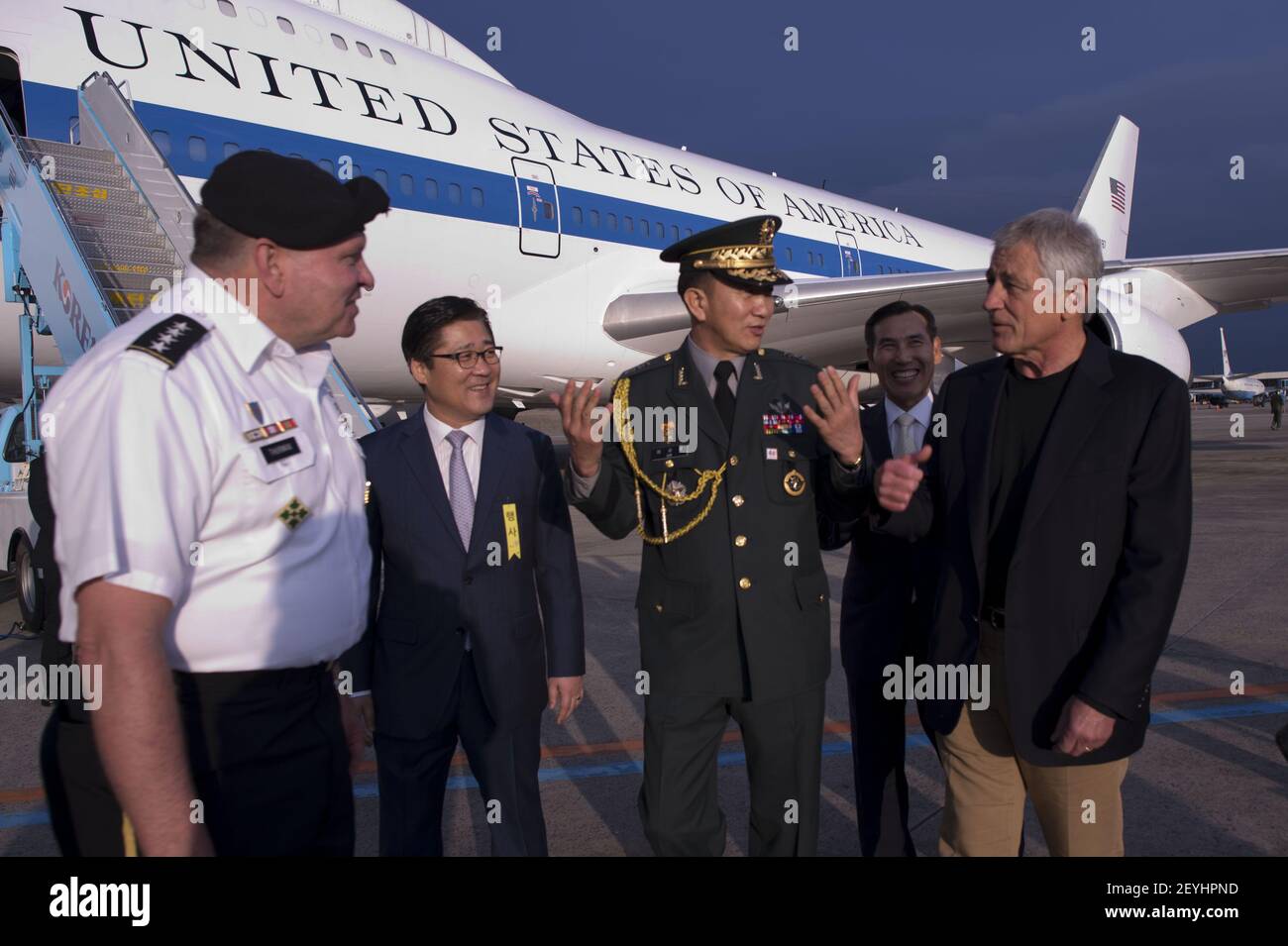 Secretary of Defense Chuck Hagel speaks with (from left) U.S. Army ...