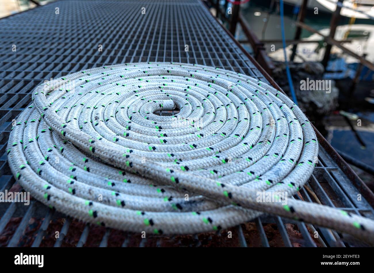 Blue fishing rope coiled on hi-res stock photography and images - Alamy