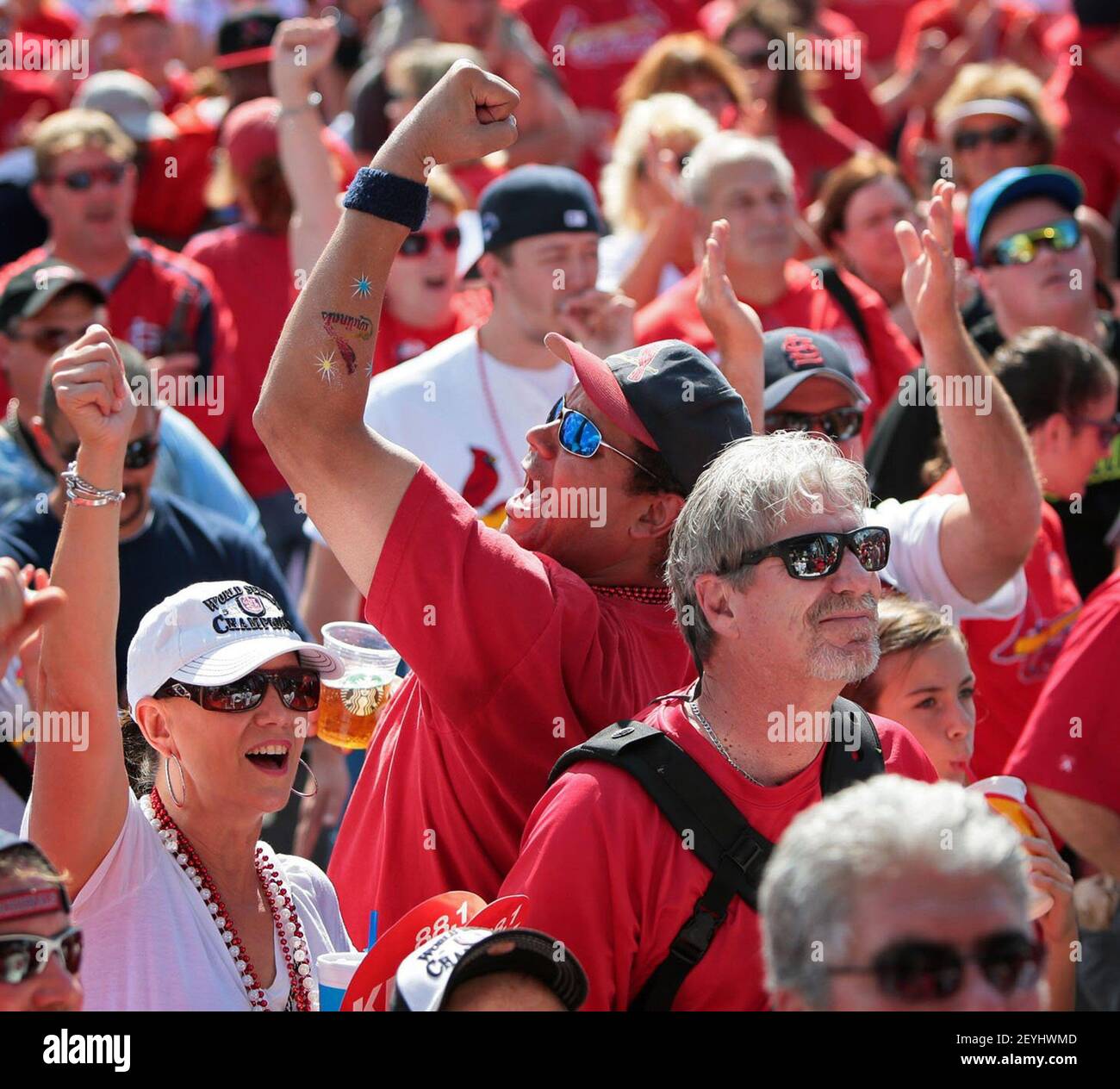 Bryan Bulliner shows off his temporary Cardinals tattoo during a pep ...