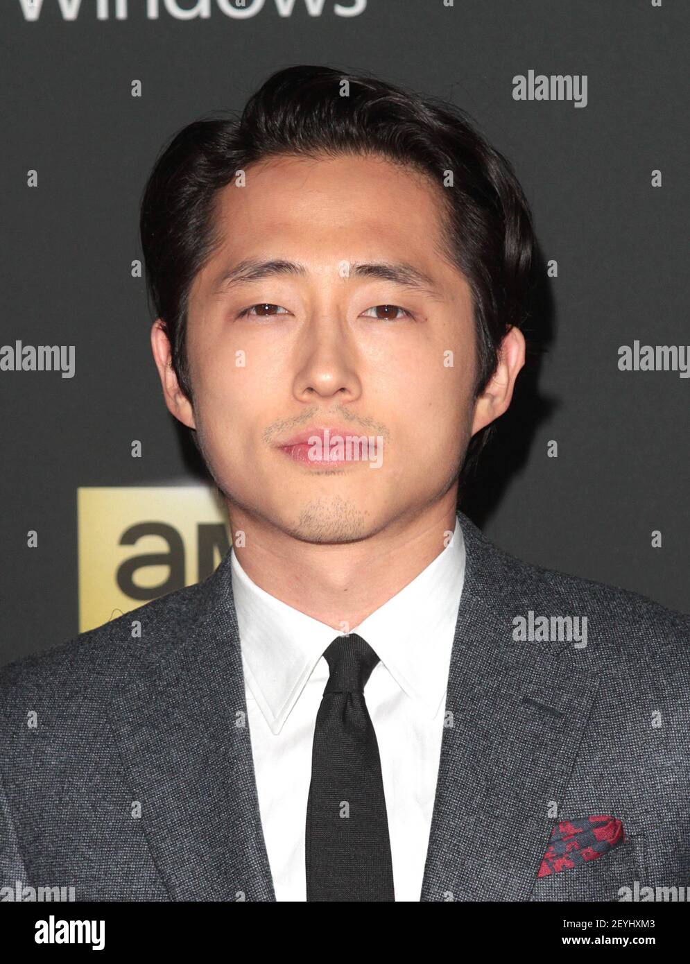 Steven Yeun attends "The Walking Dead" Seaons Four Premiere at the ...