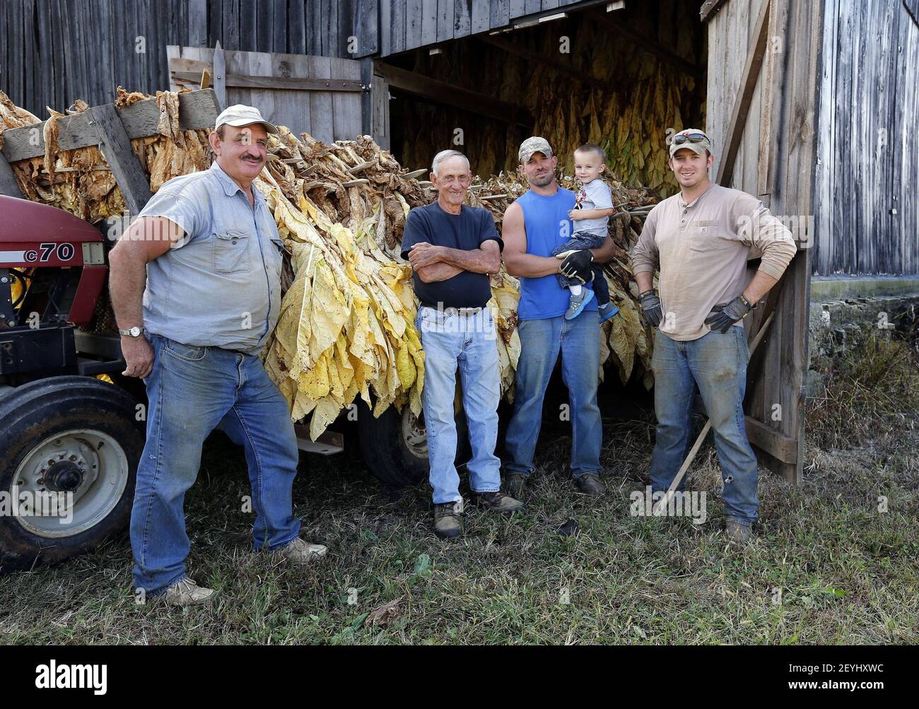 From left, Gary Shell, 58, G.B. Shell, 85, Giles Shell, 28 (holding ...
