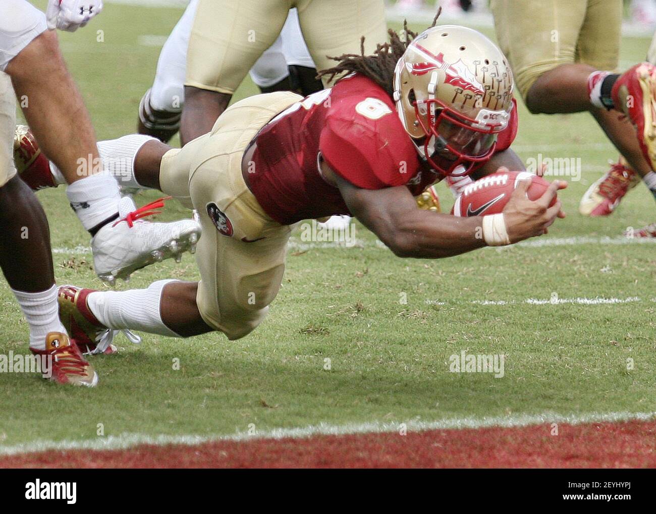 Florida State running back Devonta Freeman dives into the end zone for ...