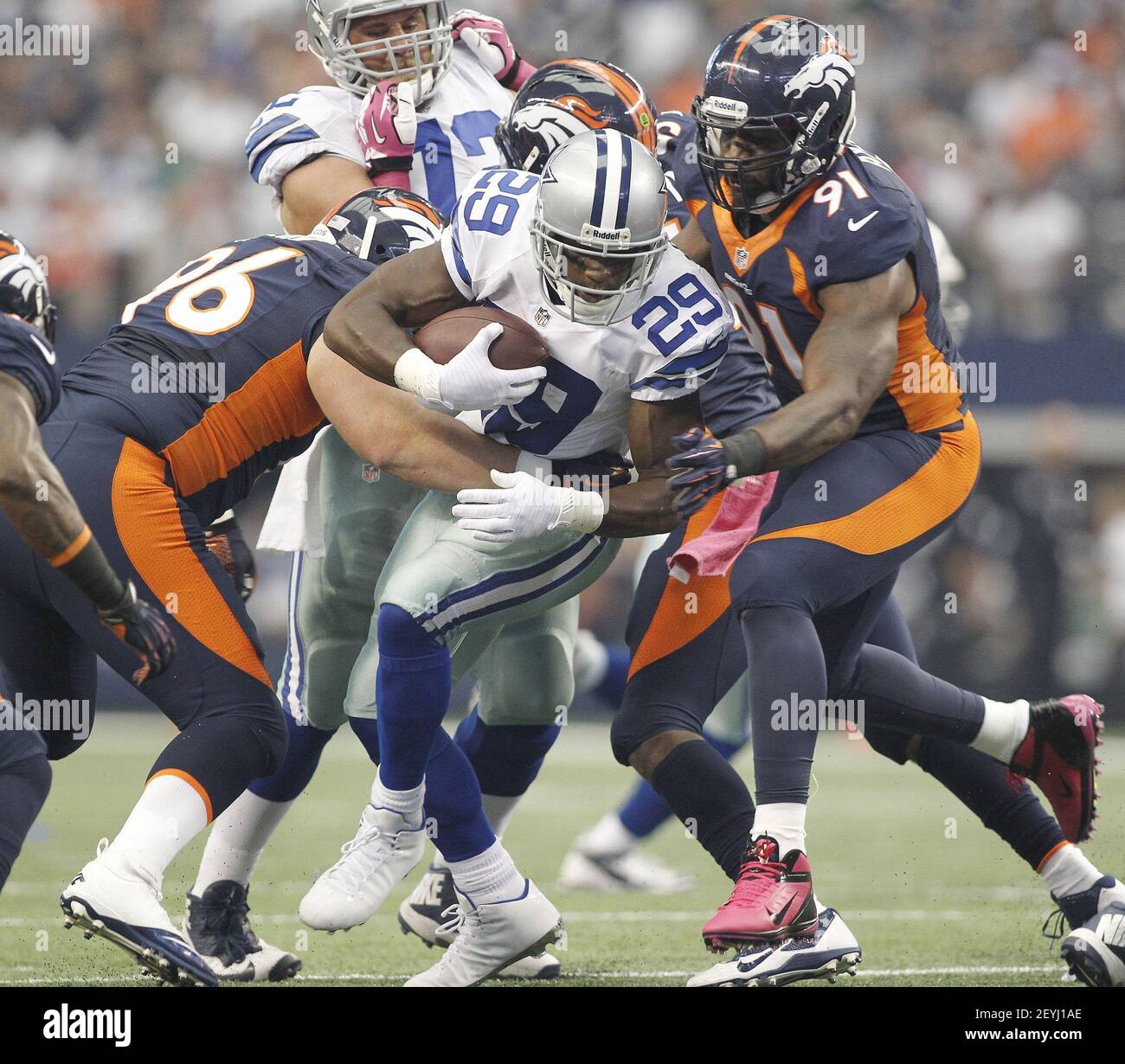 DeMarco Murray of the Dallas Cowboys tries to break through Denver ...