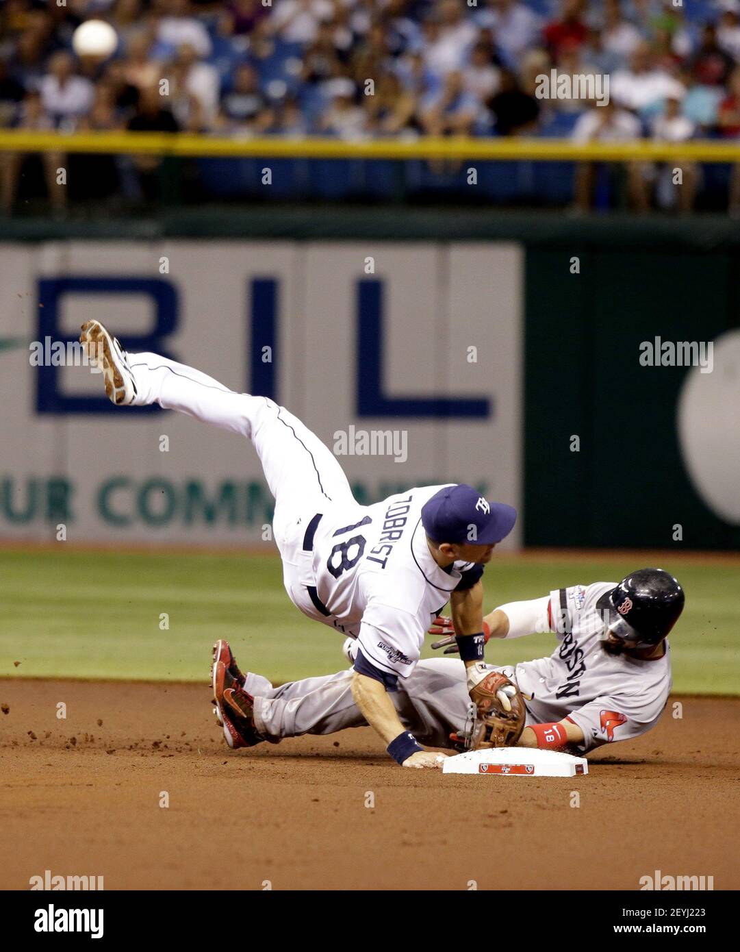 Boston Red Sox right fielder Shane Victorino (18) is out at second, but ...