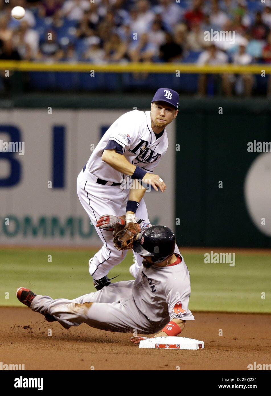 Boston Red Sox right fielder Shane Victorino (18) is out at second, but ...