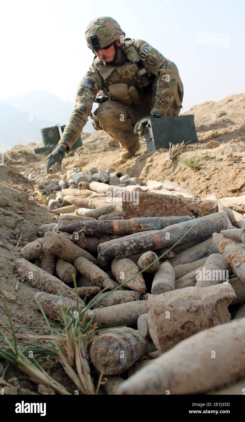 U.S. Army Sgt. 1st Class Andrew Olson, an explosive ordnance disposal ...