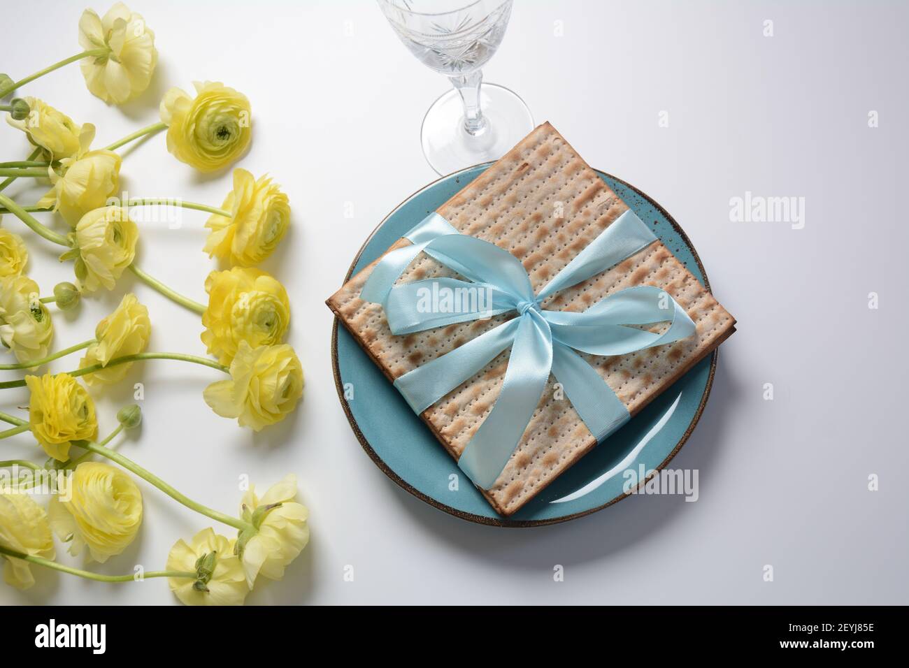 Table served for Passover (Pesach) indoors, with matzah bread as ...