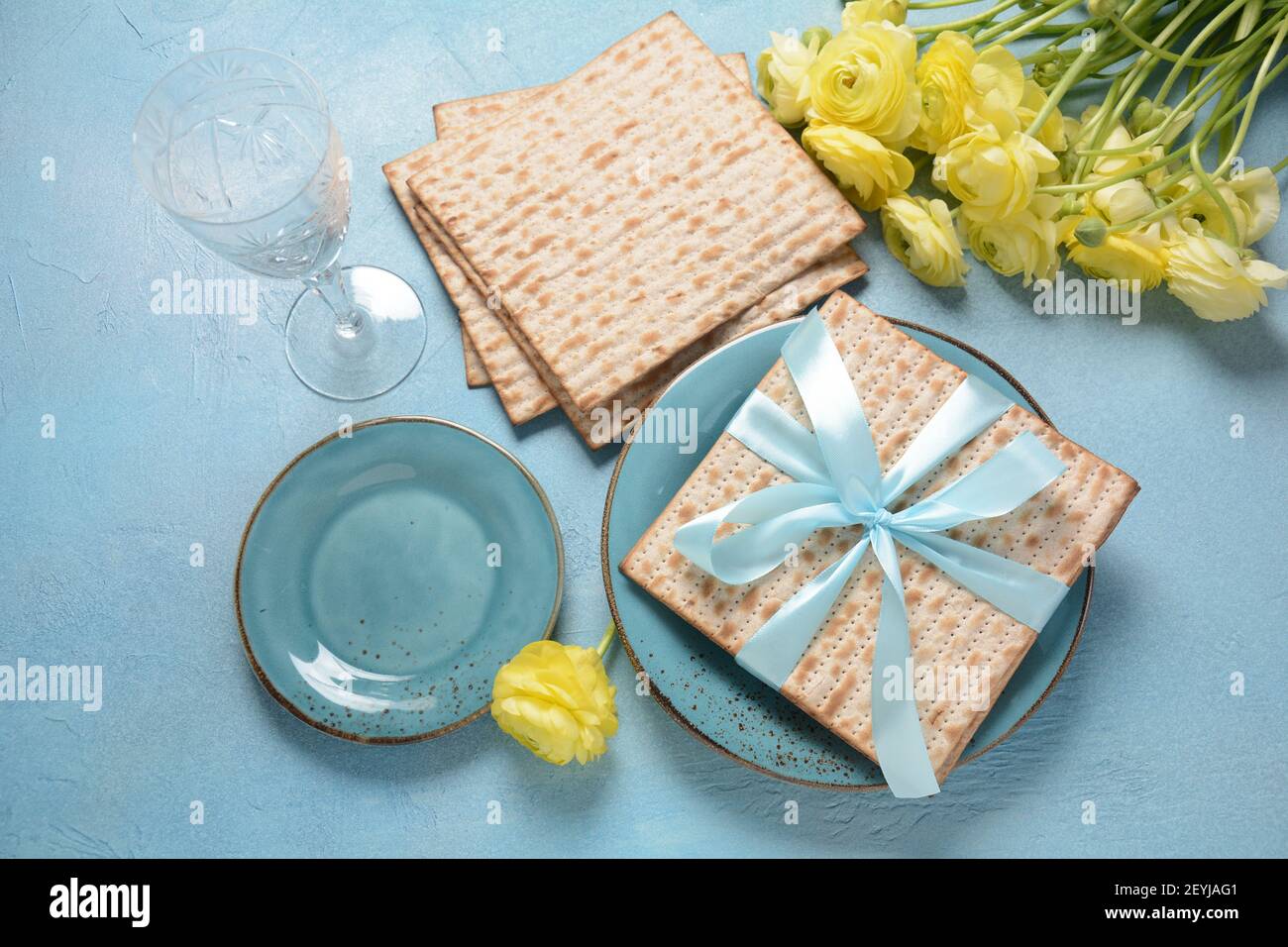 Table served for Passover (Pesach) indoors, with matzah bread as ...