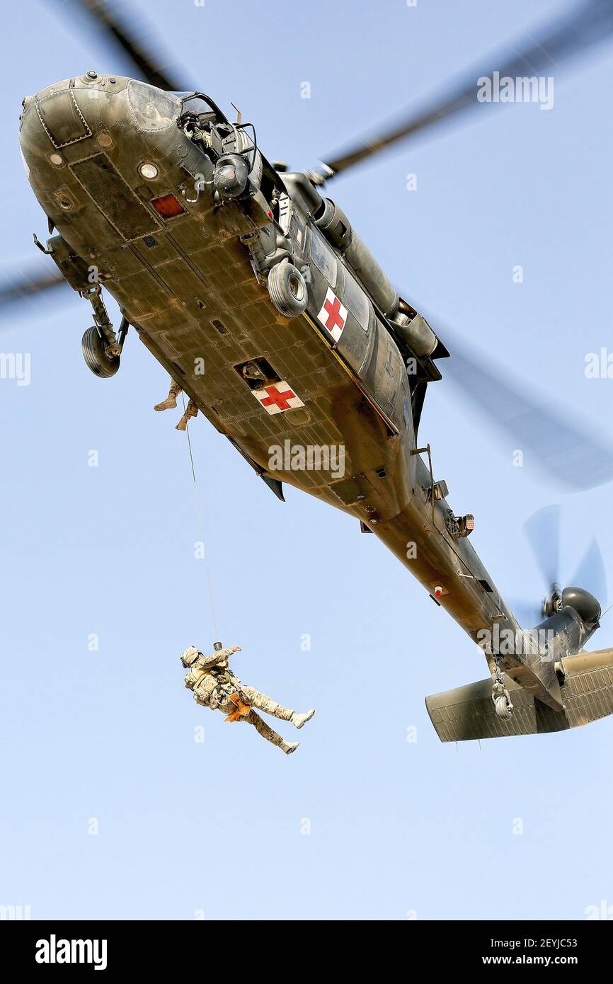 Royal Australian Air Force Leading Aircraftman Lance Day is hoisted on ...