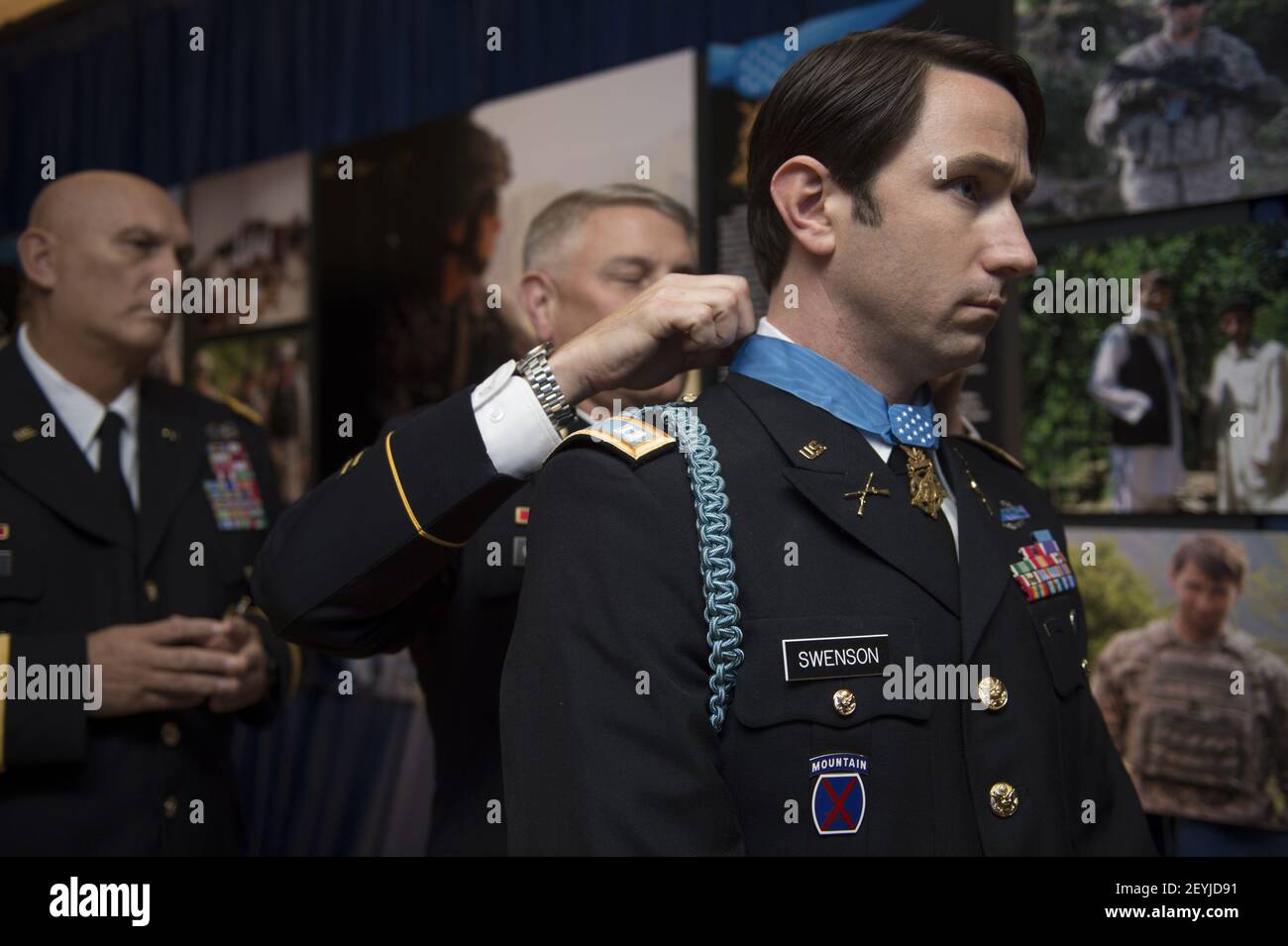Sgt. Maj. of the Army Raymond F. Chandler III places the Medal of Honor ...