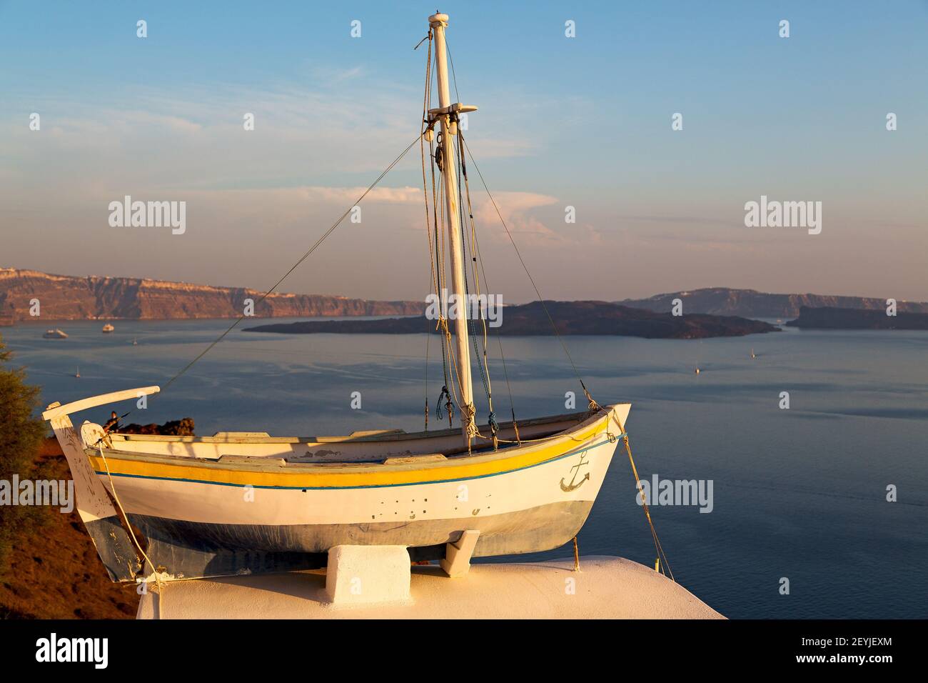 Sunset boat in europe island Stock Photo - Alamy