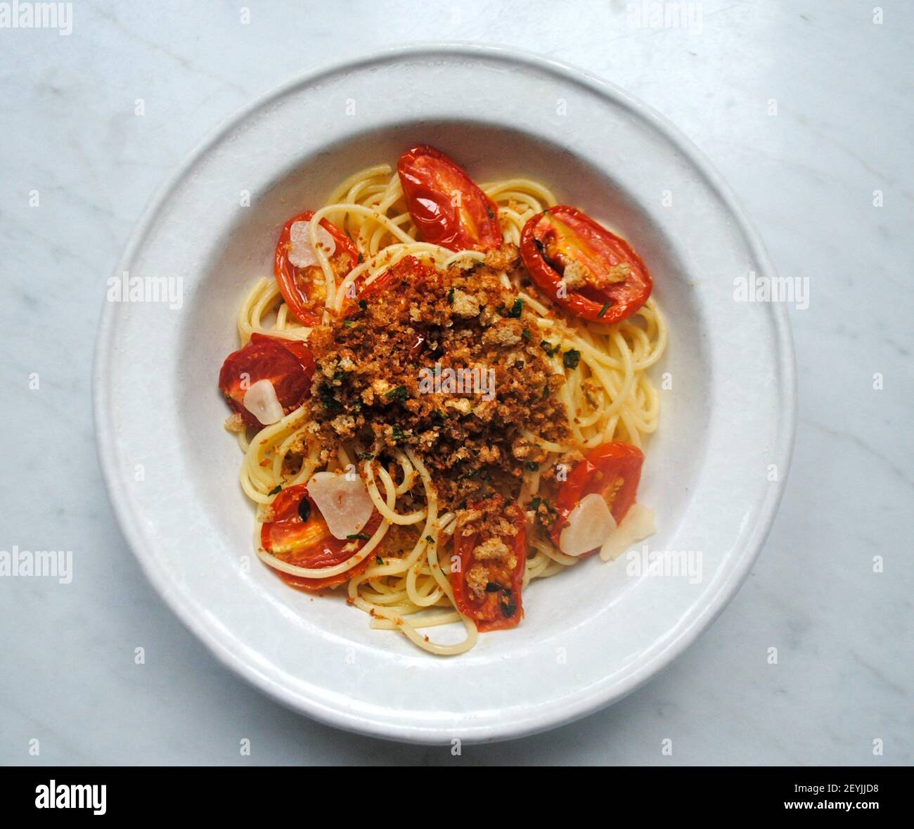 Roasted tomatoes bring an intense sweetness to this simple spaghetti ...