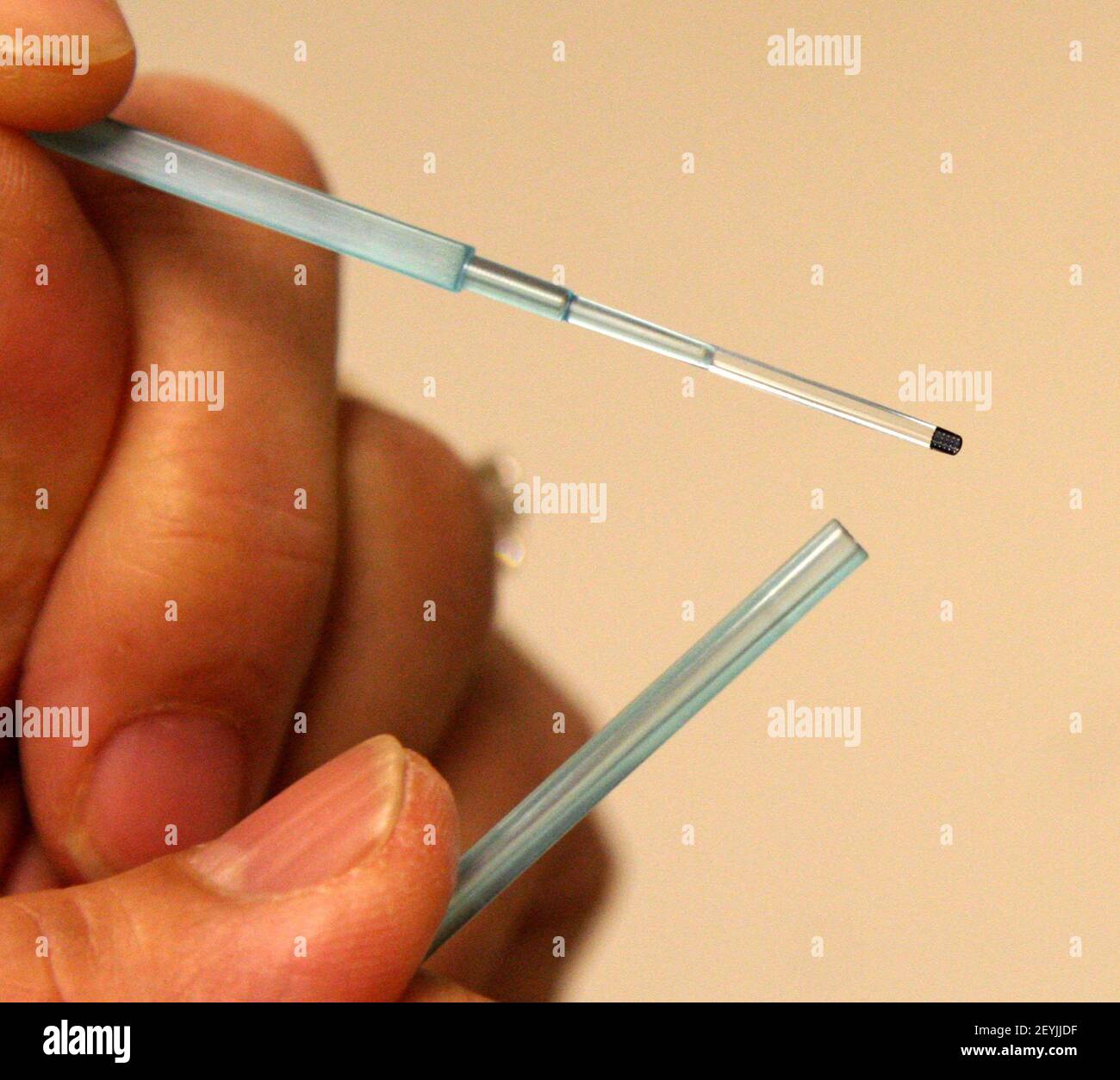 The freezing platform for an embryo, top, also known as a straw, in the ...