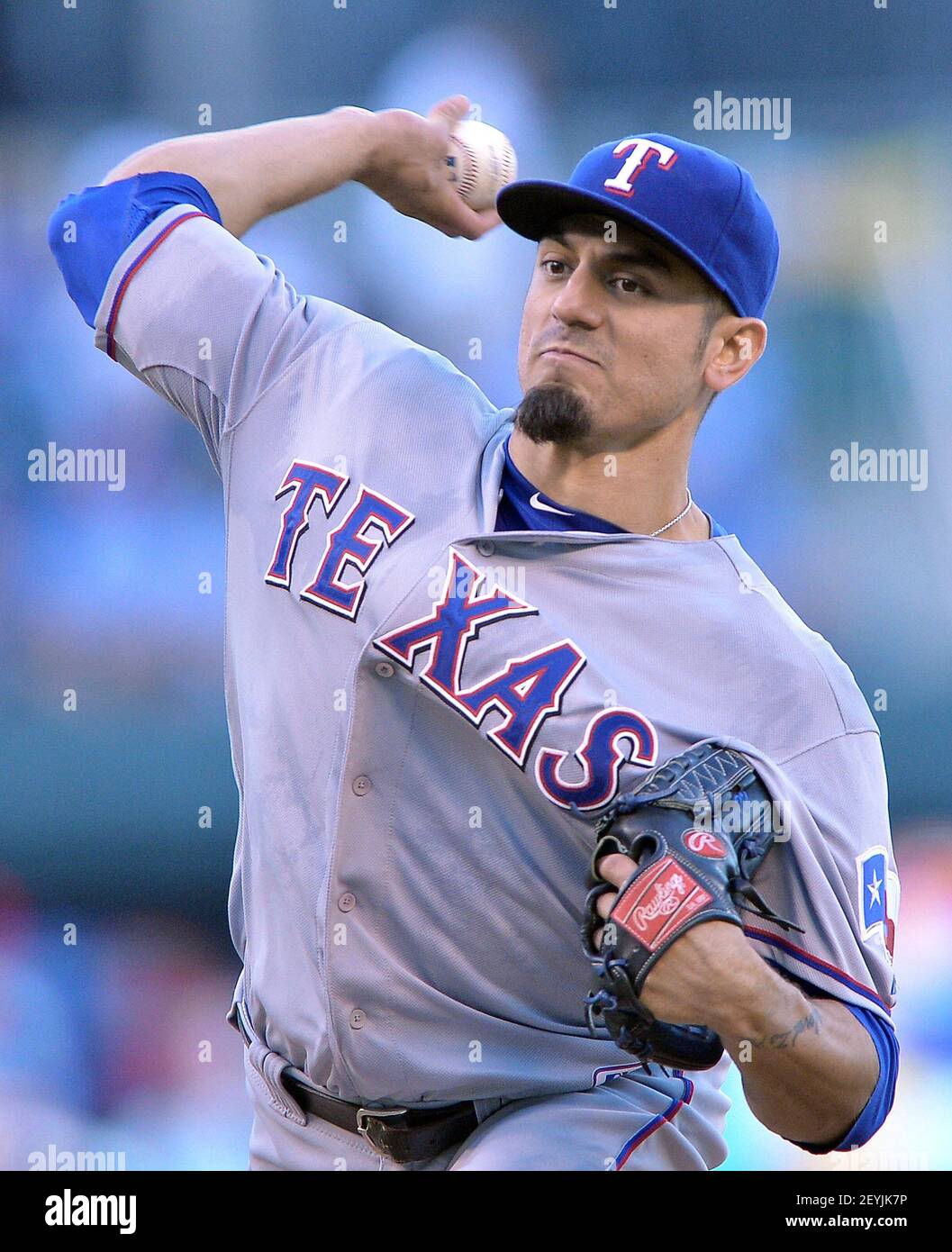 Texas Rangers starting pitcher Matt Garza throws against the Kansas ...