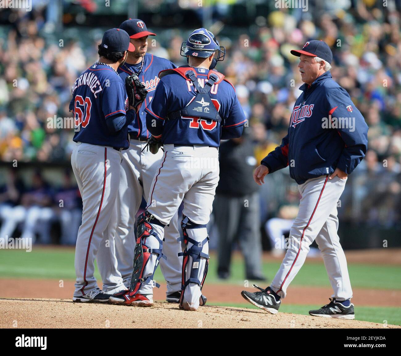 Minnesota Twins pitching coach Rick Anderson approaches the mound to ...
