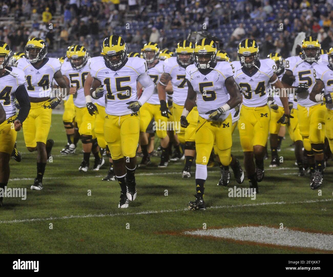 Michigan heads back into the locker room before the start of play ...
