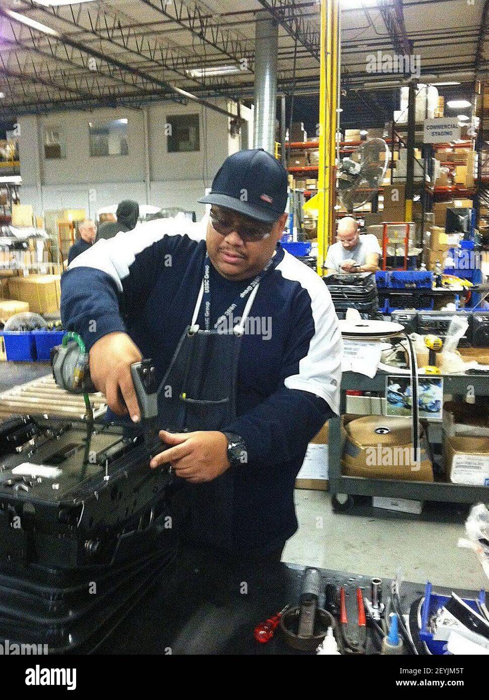 Ross Williams, of Norristown, assembles a bus-driver's seat at the USSC ...