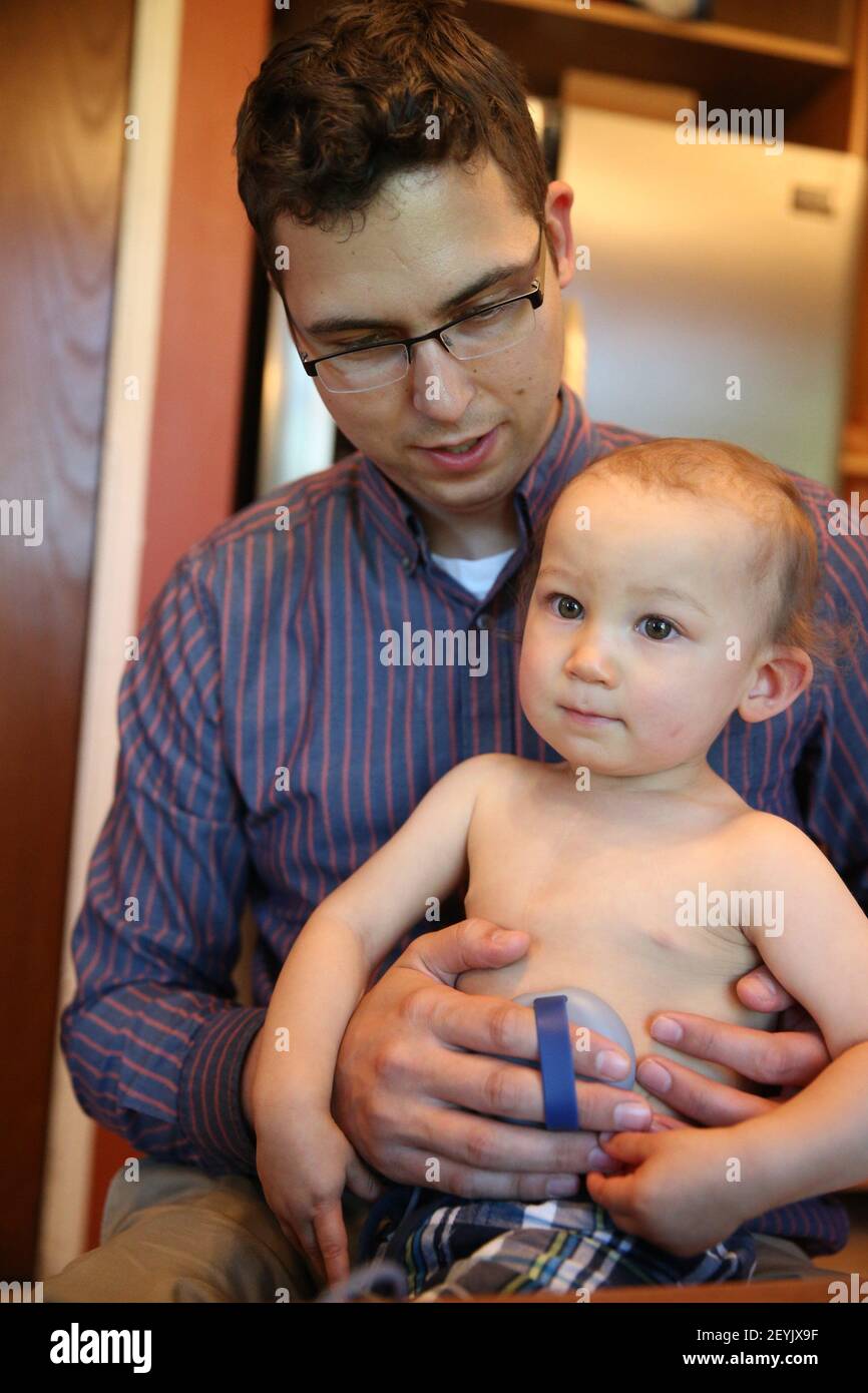 At a young age Asher Thomas, with father Aaron, has gone through many ...