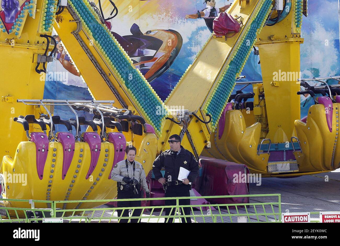 A CCBI officer, left, and a Wake County Sheriff officer examine the ...