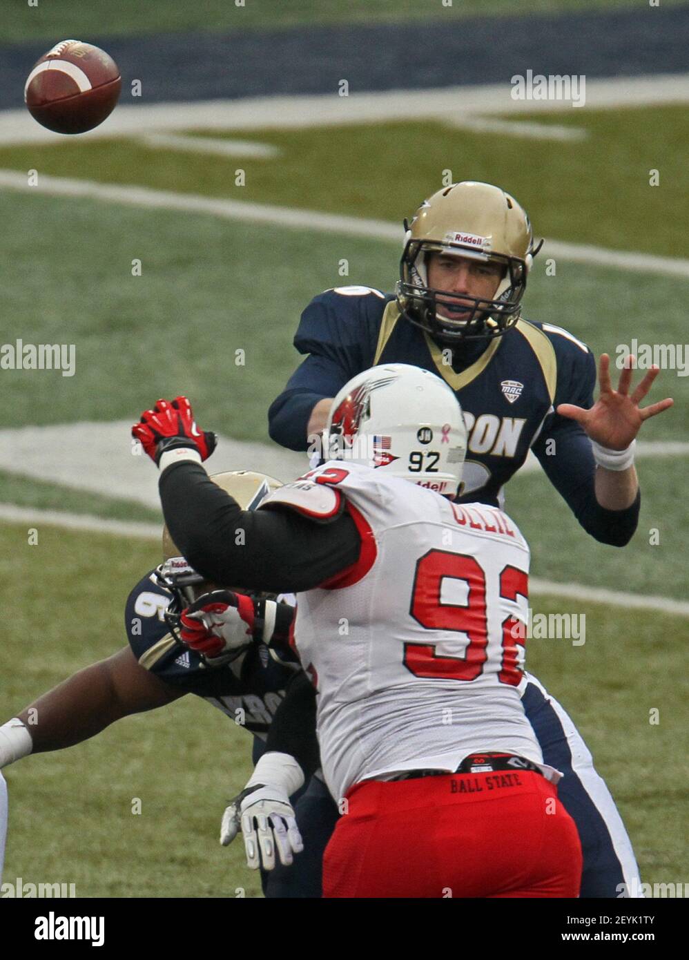 Akron quarterback Kyle Pohl fires a pass over Ball State defensive ...
