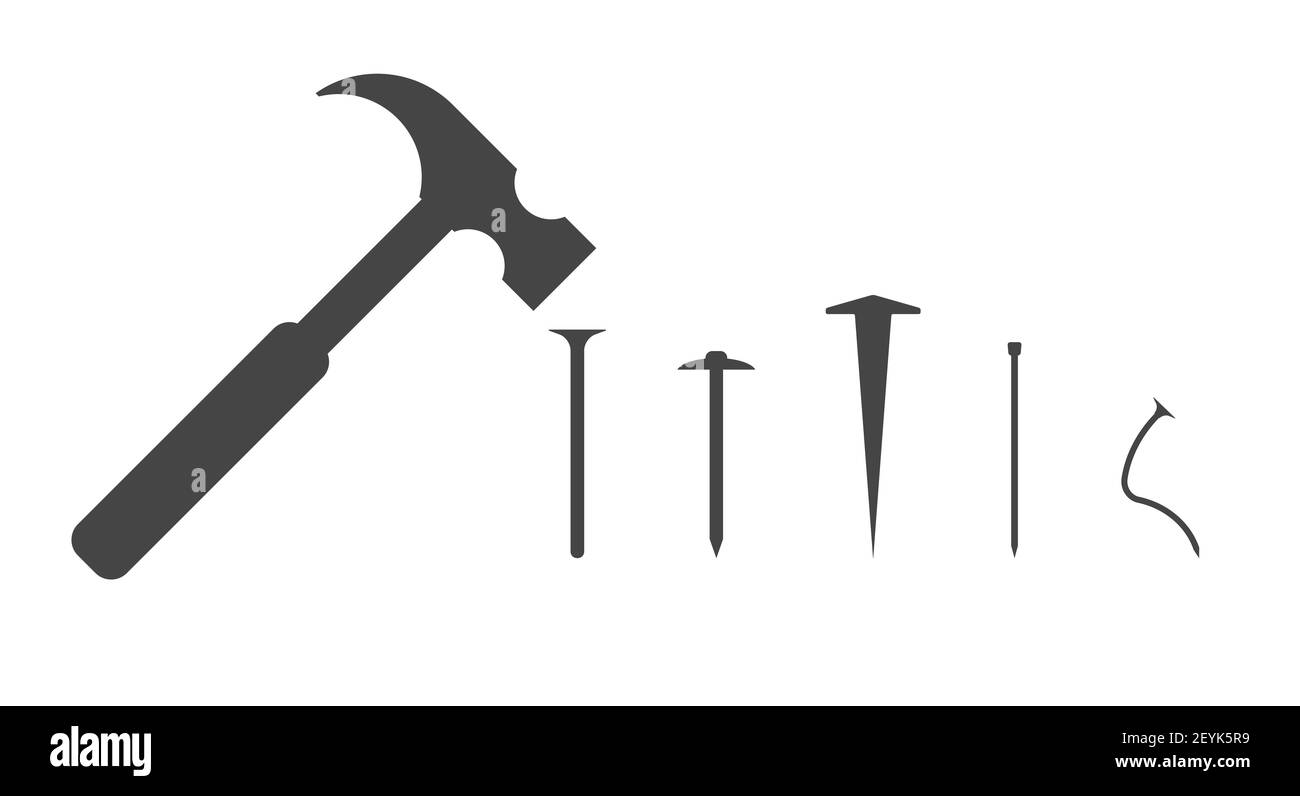 Carpenter hammer and several different types of nails. Bent nail ...